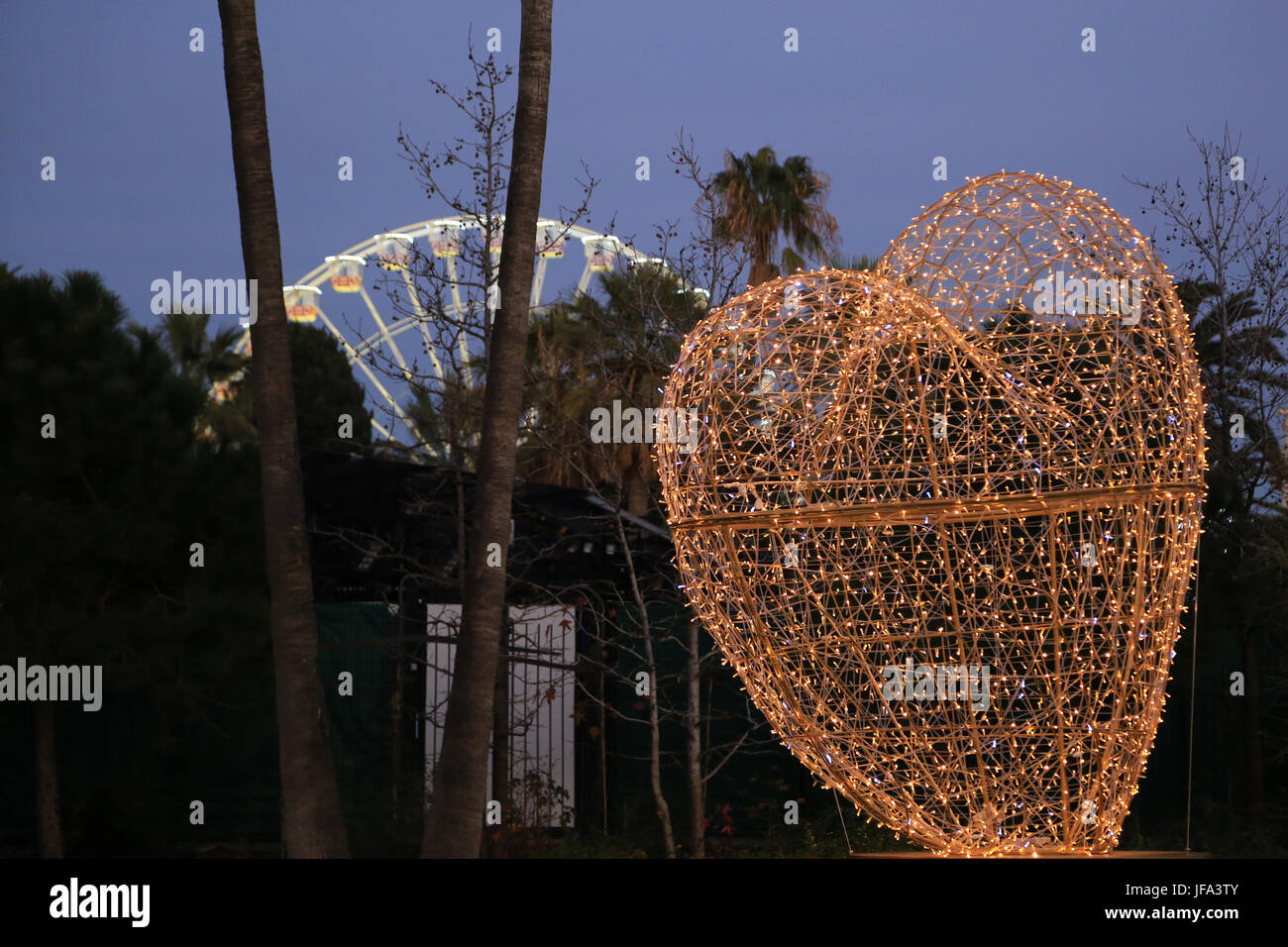Nice, lighted heart and ferris wheel Stock Photo - Alamy