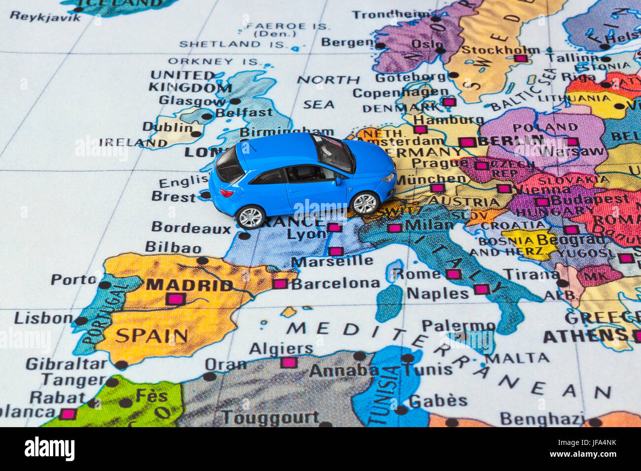 Europe map and car toy Stock Photo - Alamy