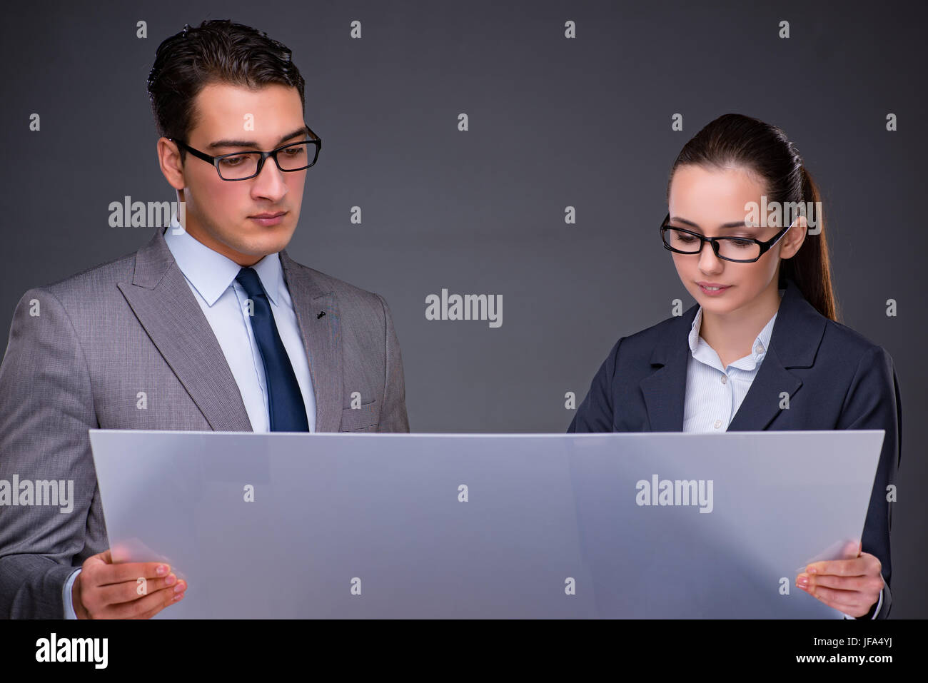 Businesspeople working on virtual screen Stock Photo - Alamy