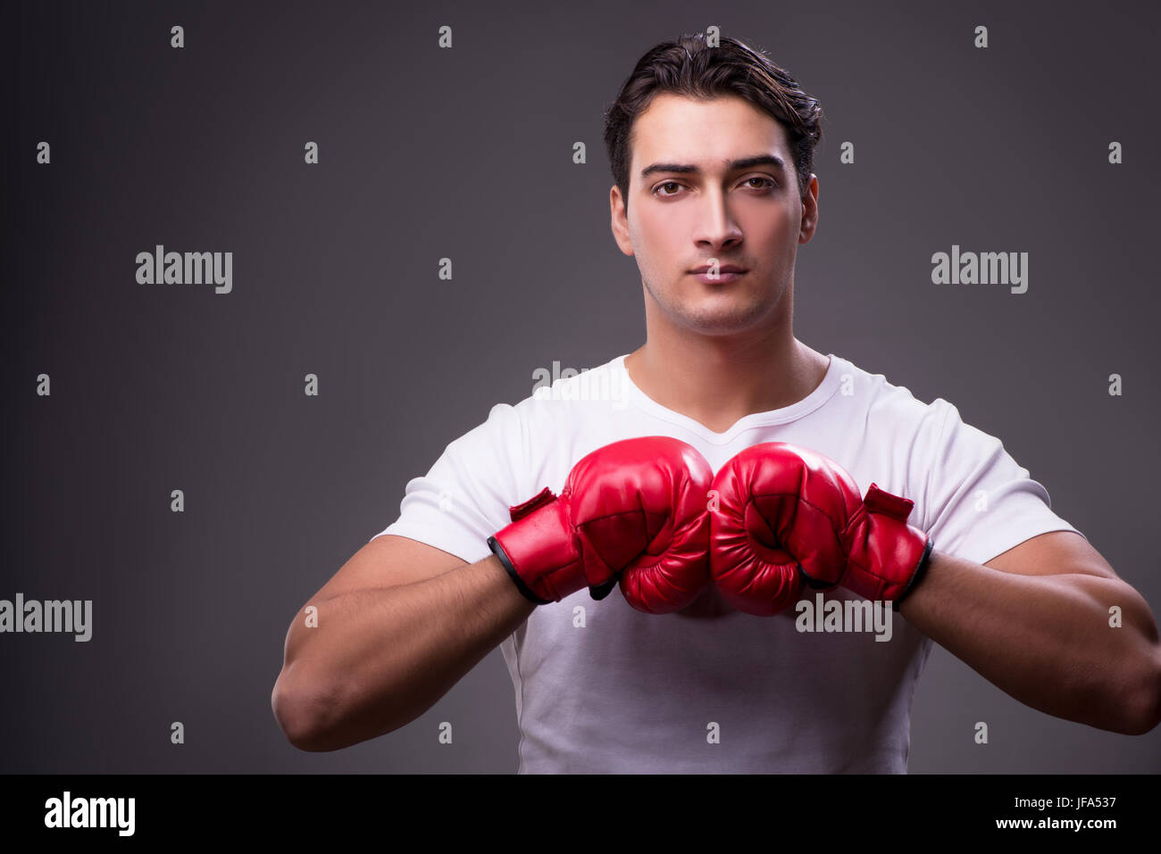 Handsome boxer in boxing concept Stock Photo - Alamy