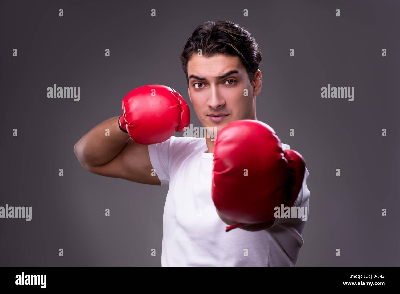 Handsome boxer in boxing concept Stock Photo - Alamy