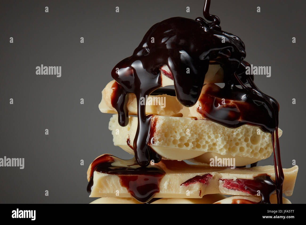 syrop pouring onto a piece of chocolate Stock Photo - Alamy