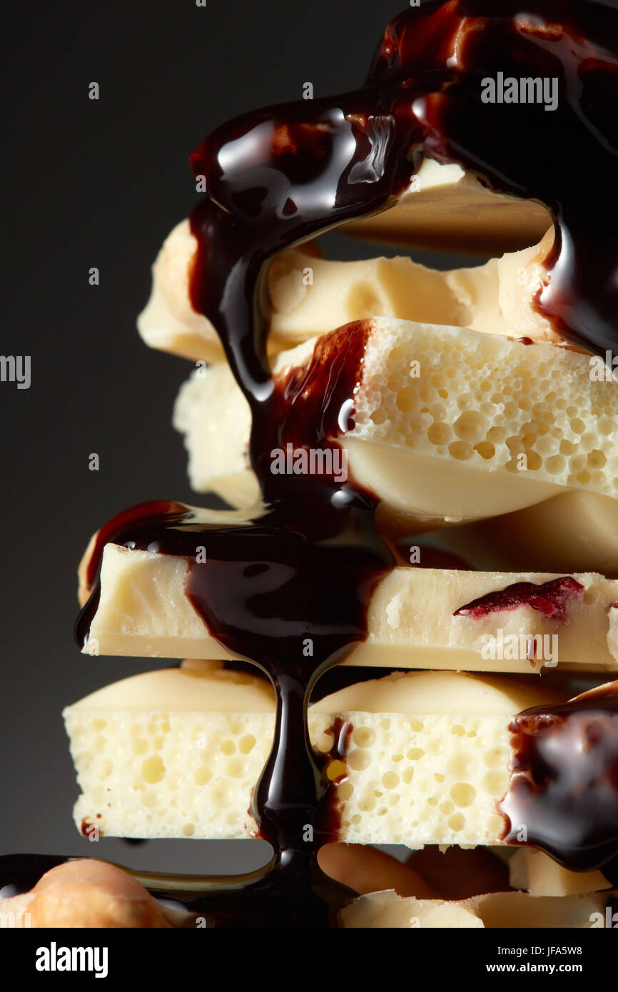syrop pouring onto a piece of chocolate Stock Photo - Alamy