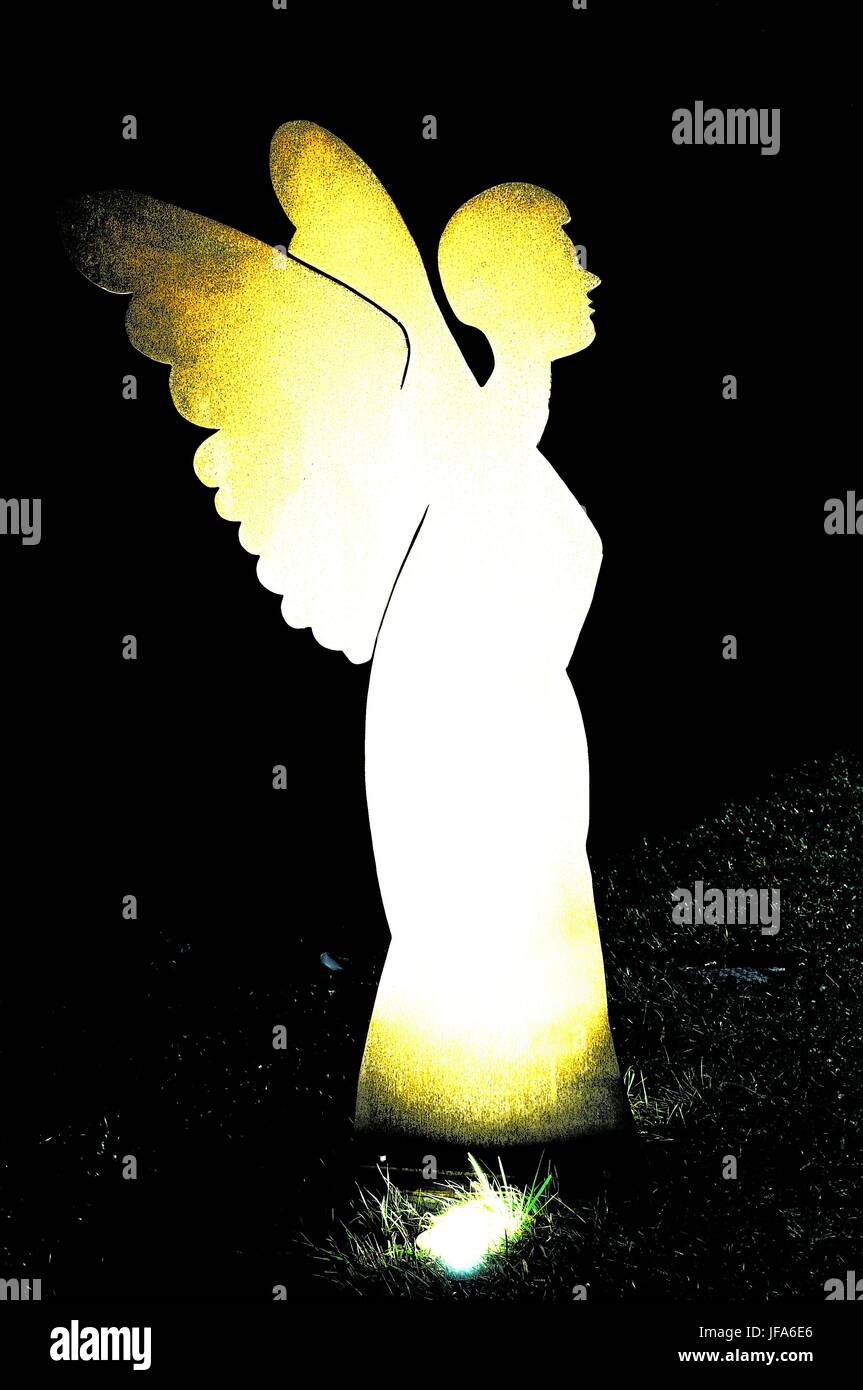 the illuminated angel golden yellow Stock Photo - Alamy