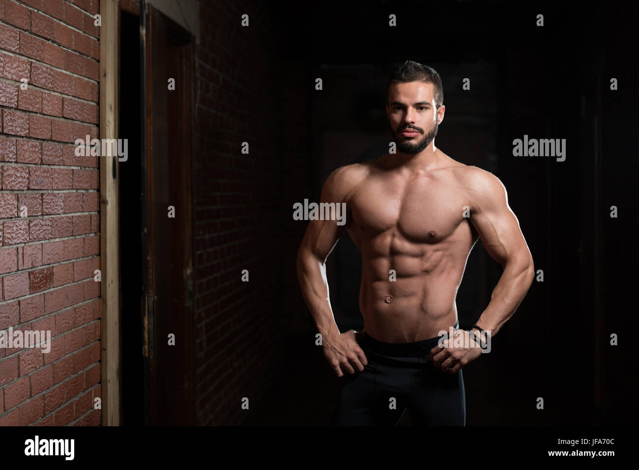 Portrait of a Young Physically Fit Model Showing His Well Trained Body ...