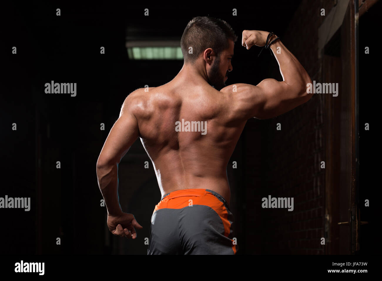 Portrait of a Young Physically Fit Model Showing His Well Trained Body ...