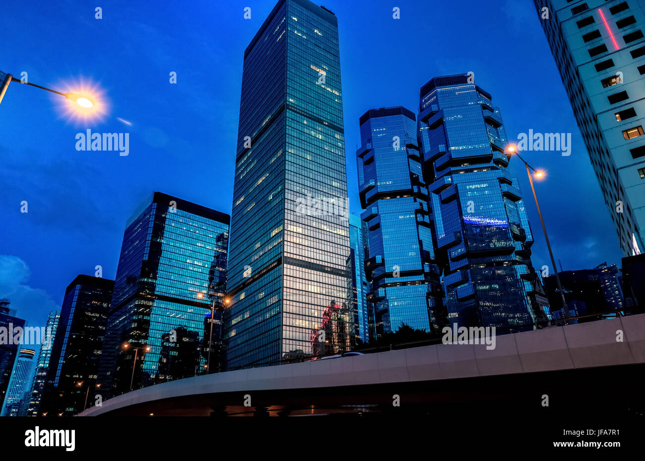Commercial buildings at night in Hong Kong Stock Photo - Alamy