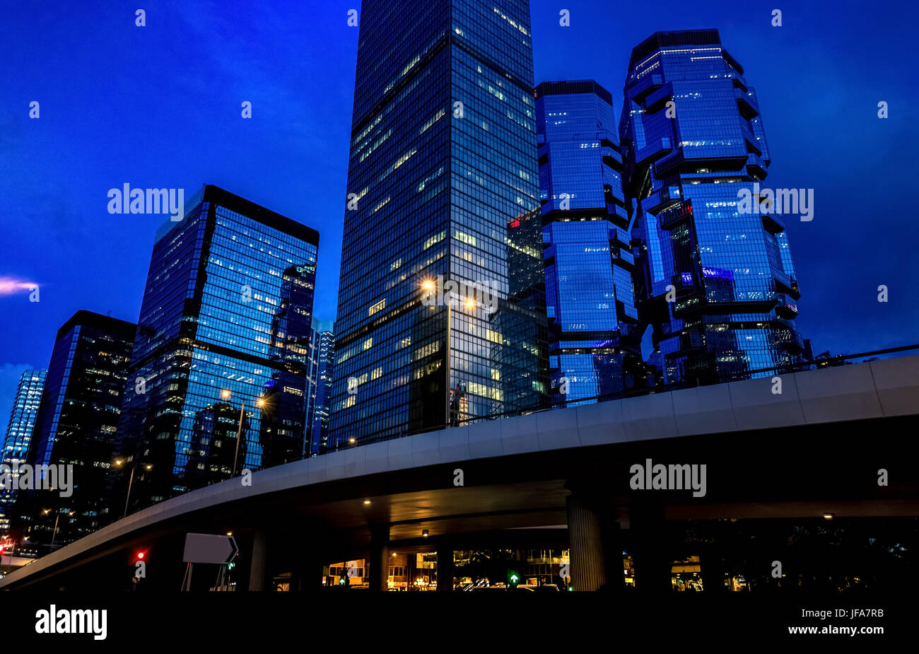 Commercial buildings at night in Hong Kong Stock Photo - Alamy