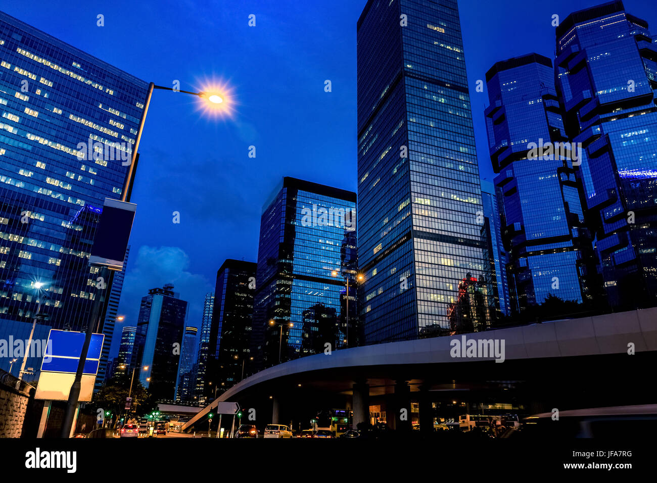 Commercial buildings at night in Hong Kong Stock Photo - Alamy