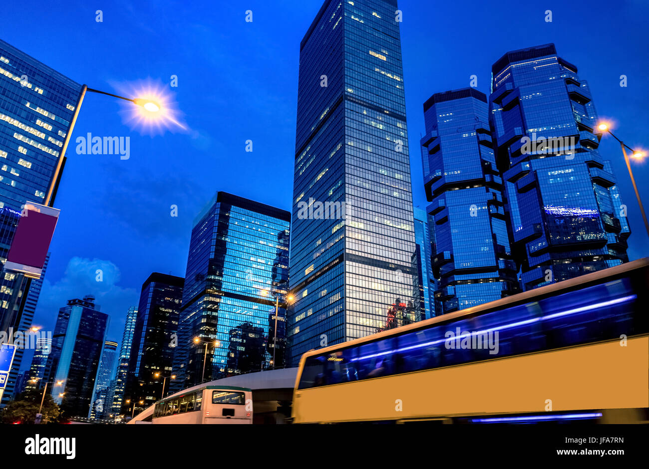 Commercial buildings at night in Hong Kong Stock Photo - Alamy