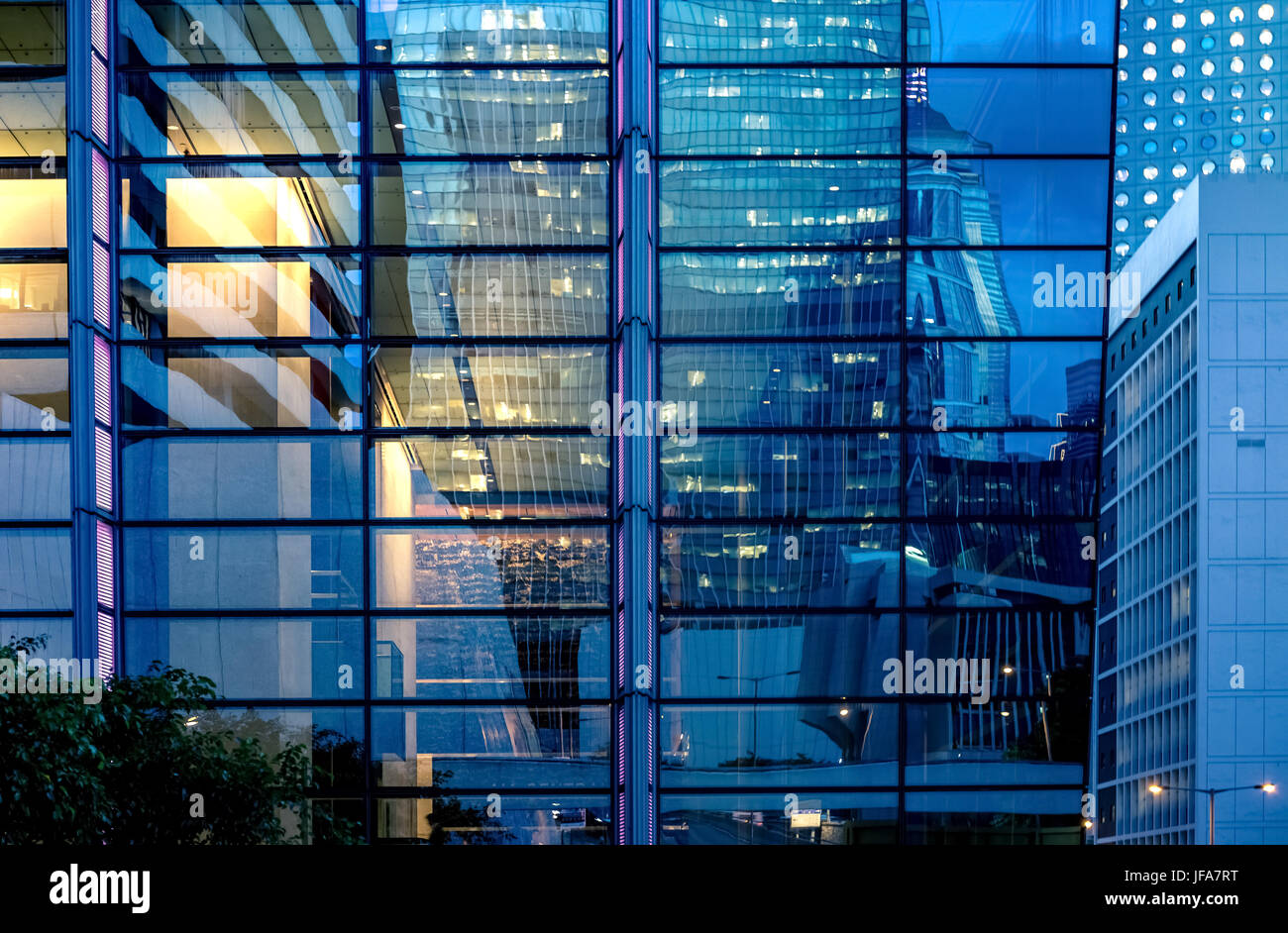 Commercial buildings at night in Hong Kong Stock Photo - Alamy