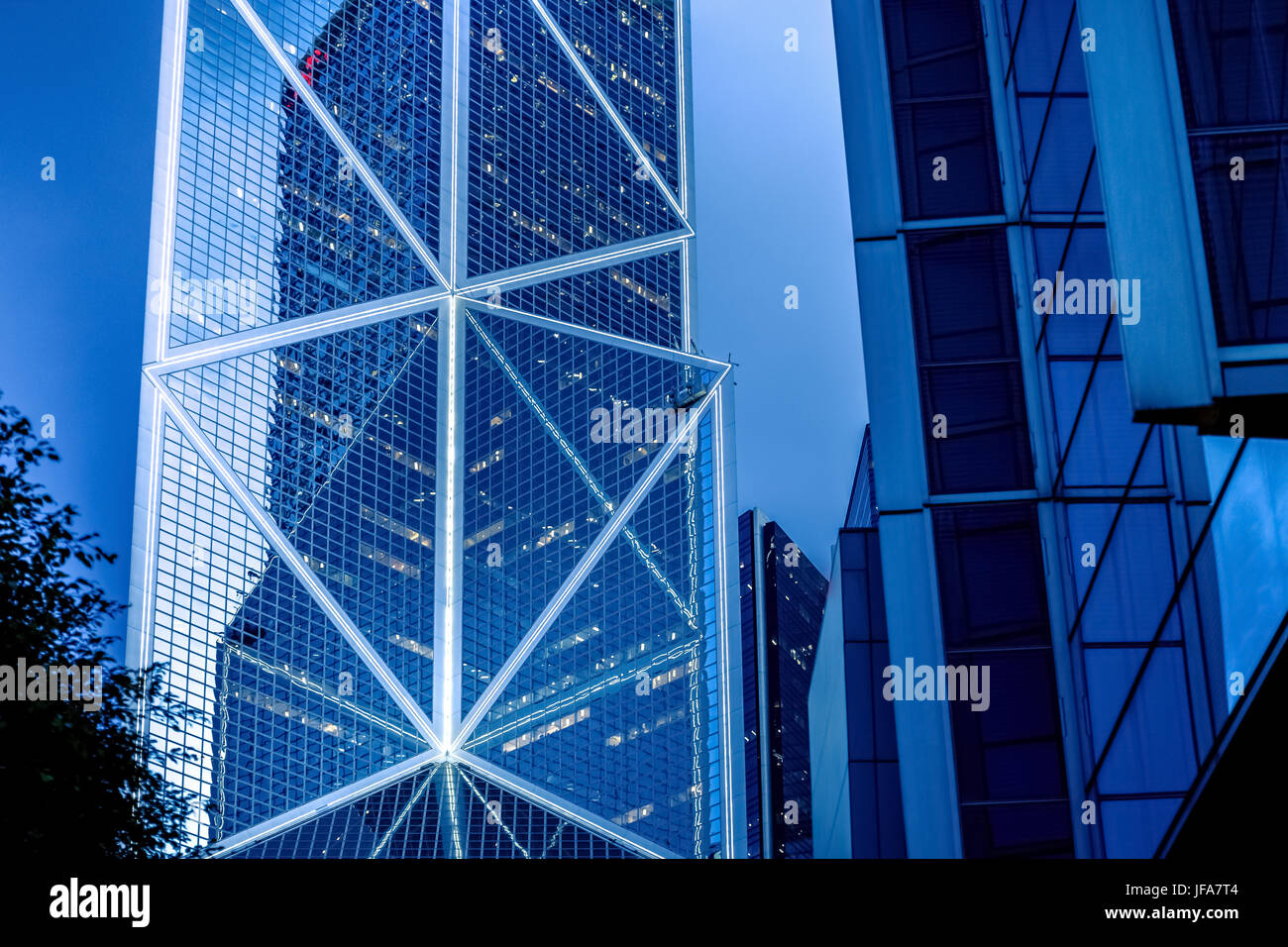 Commercial buildings at night in Hong Kong Stock Photo - Alamy