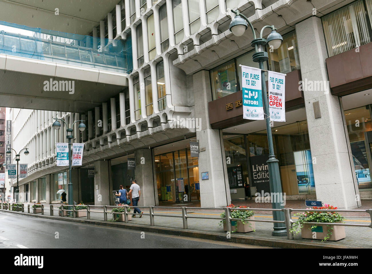 Tokyo, Japan. 30th june, 2017. Nitori signboards on display in Shibuya ...
