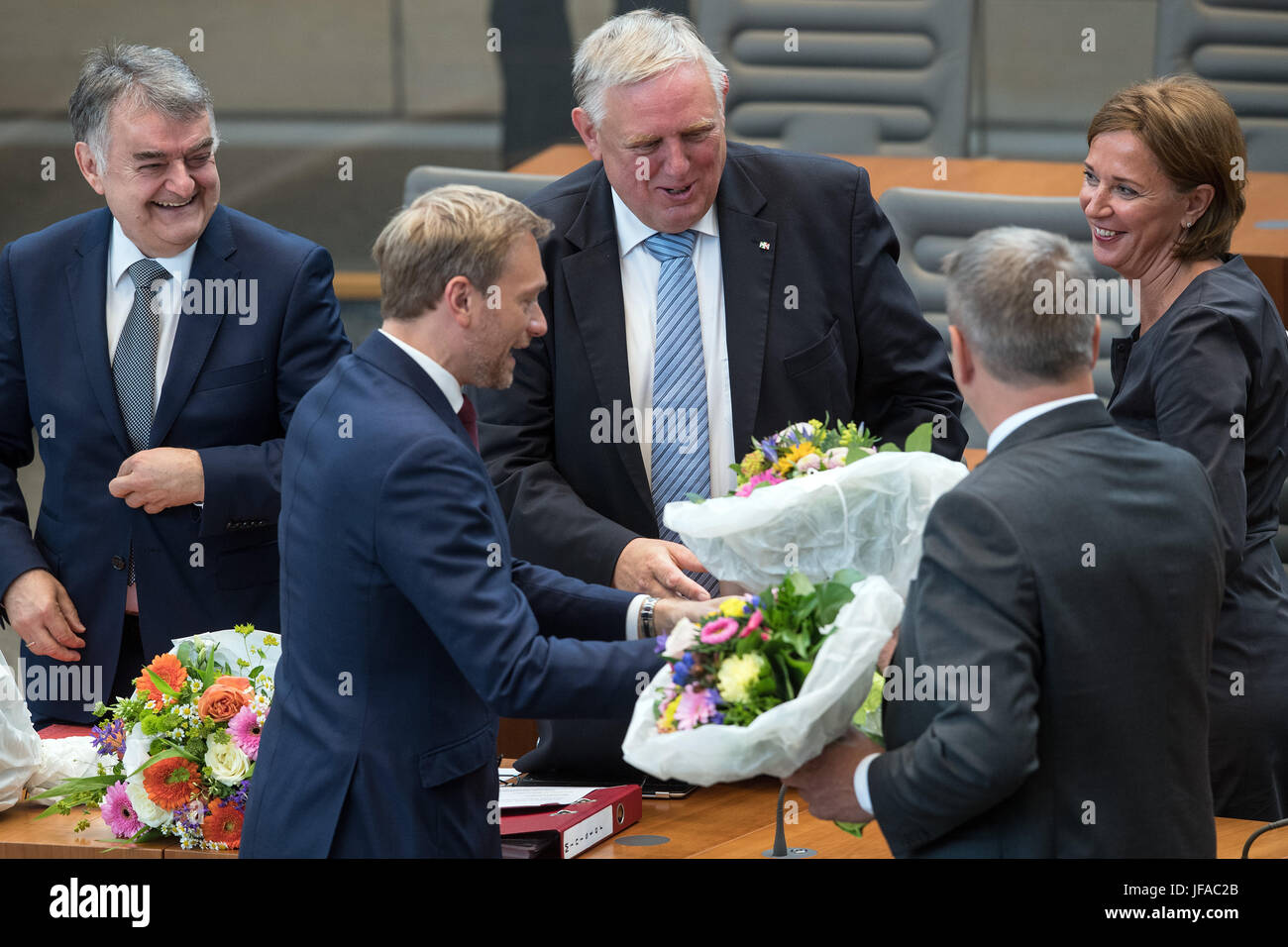 The head of the FDP Christian Lindner (2-L) with ministers Herbert Reul ...