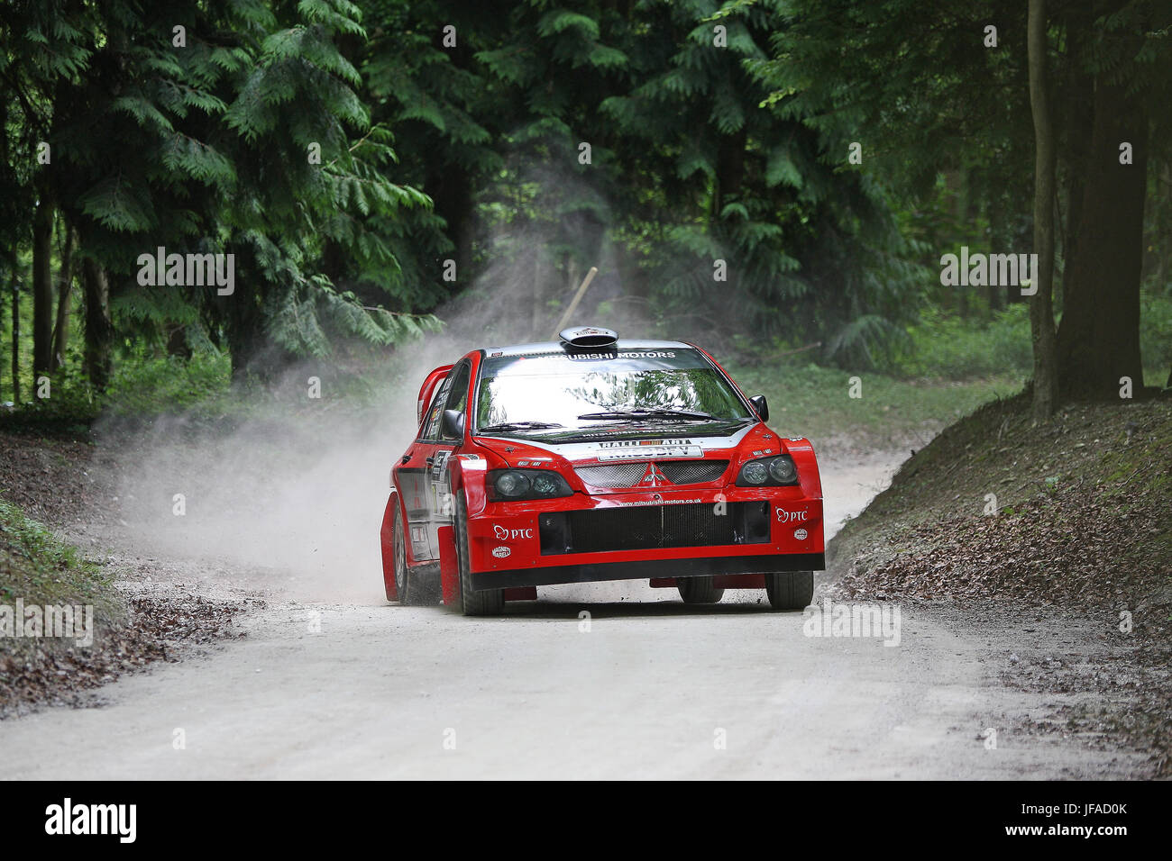 Goodwood, UK. 30th June, 2017. Mitsubishi Rally car tackles the Forrest ...