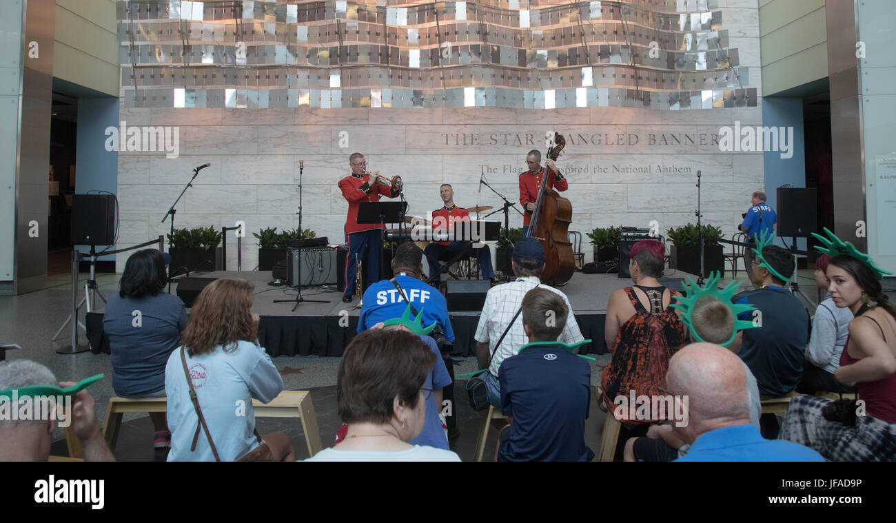 The U.S. Marines Corps Dixieland Trio performs in Flag Hall. The ...