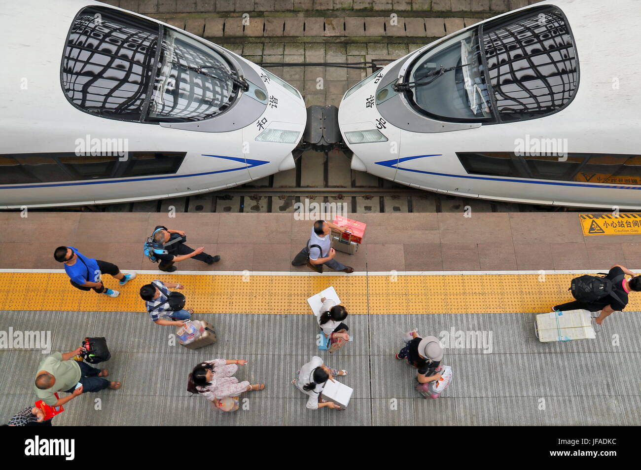 Yantai, China's Shandong Province. 30th June, 2017. Passengers prepare ...