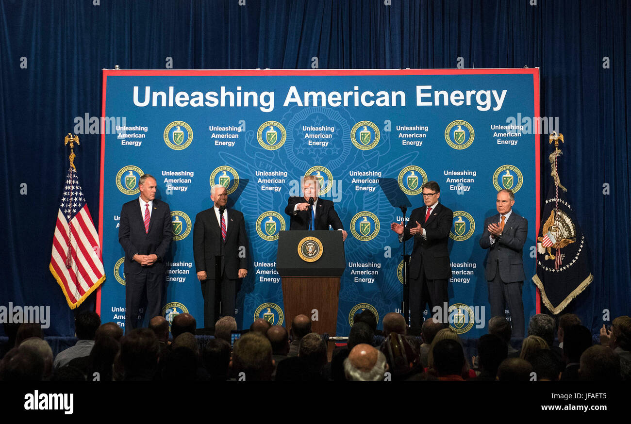 United States President Donald J. Trump (L) delivers remarks at the ...
