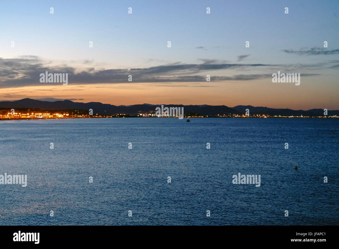 Night view of a Mediterranean beach with illuminated promenade Stock ...