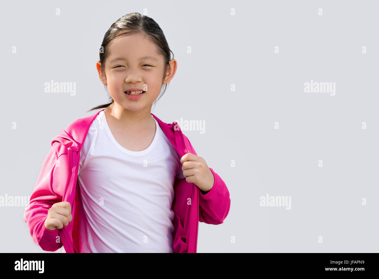 Studio Shot of Asian kid in sweater isolated on white background Stock ...