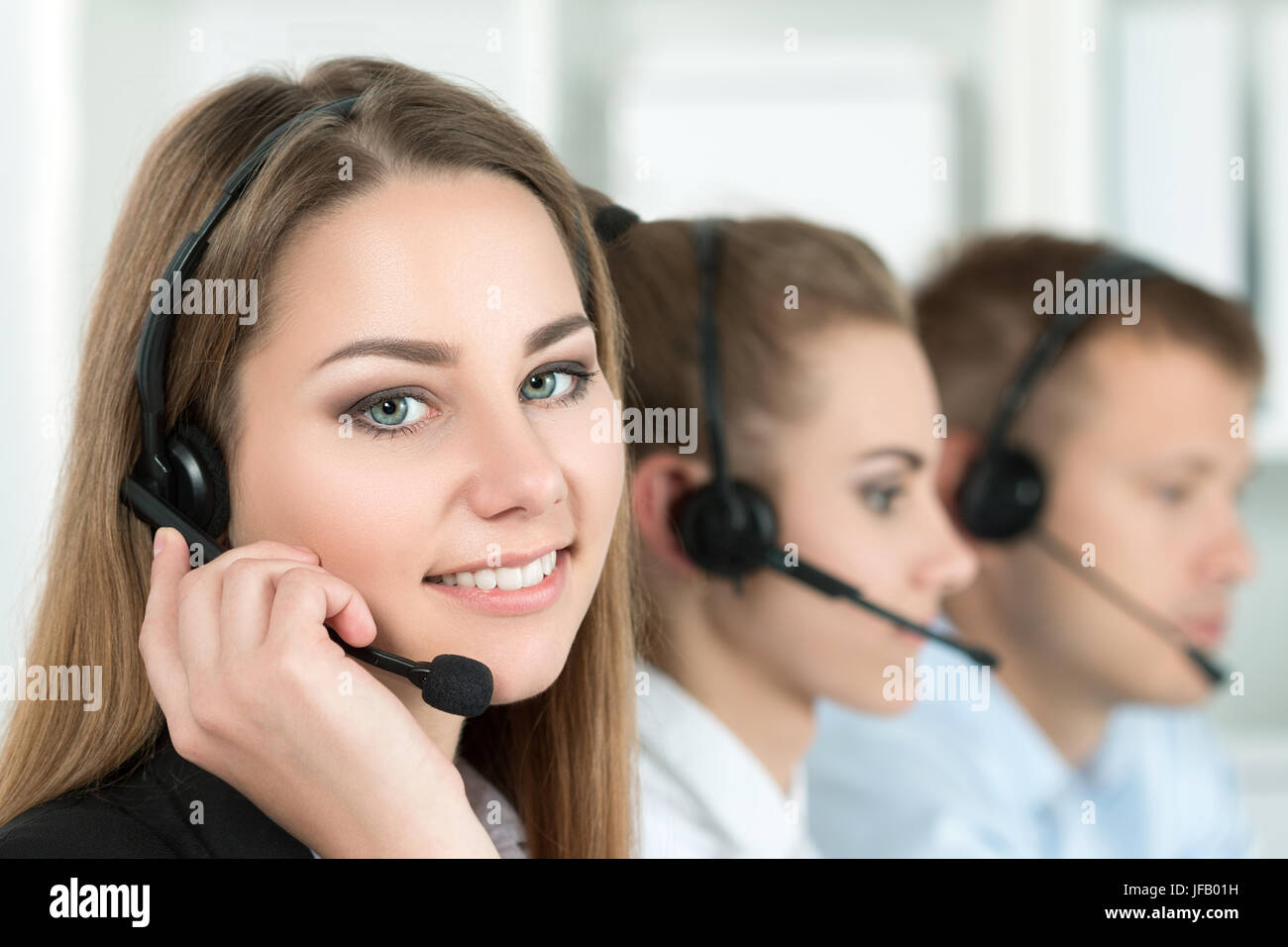 Portrait of customer service person with head phones hi-res stock ...