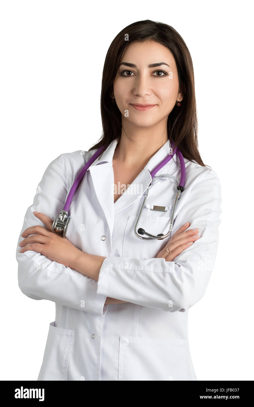 Beautiful smiling female medicine doctor with folded hands against ...