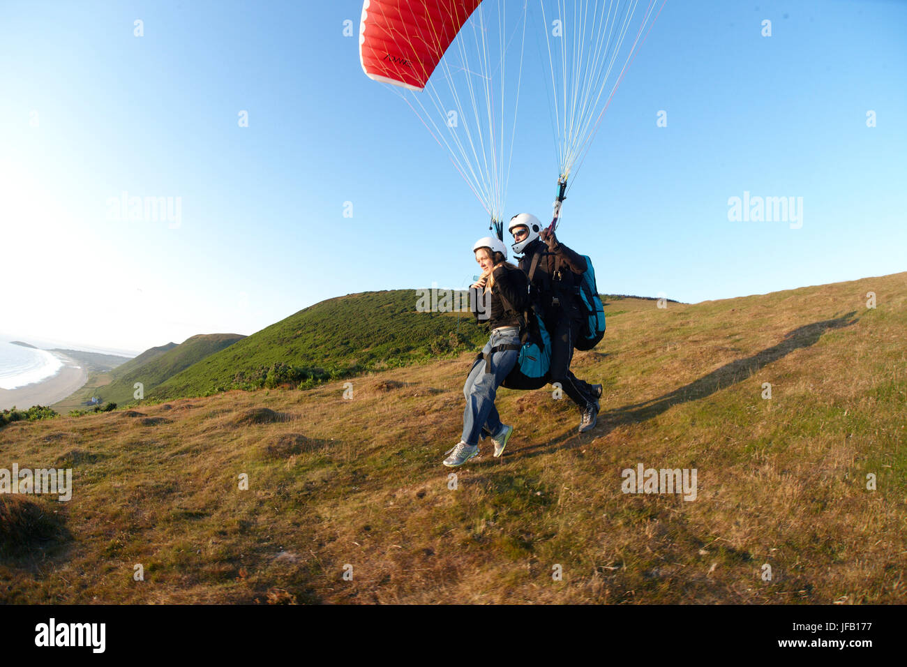 Paragliders taking off hi-res stock photography and images - Alamy
