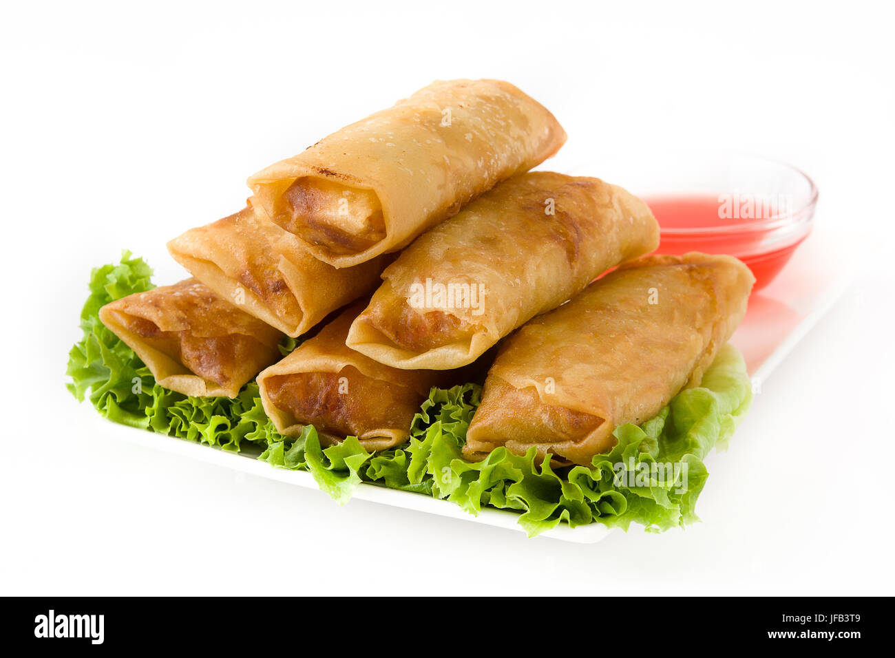 Vegetable spring rolls isolated on white background Stock Photo - Alamy