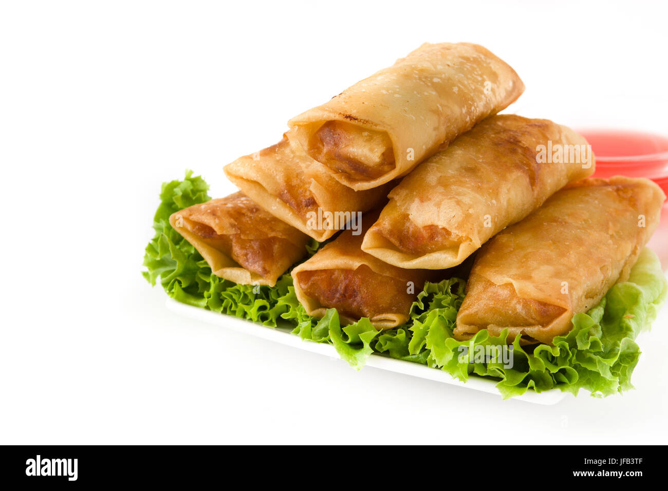 Vegetable spring rolls isolated on white background Stock Photo - Alamy
