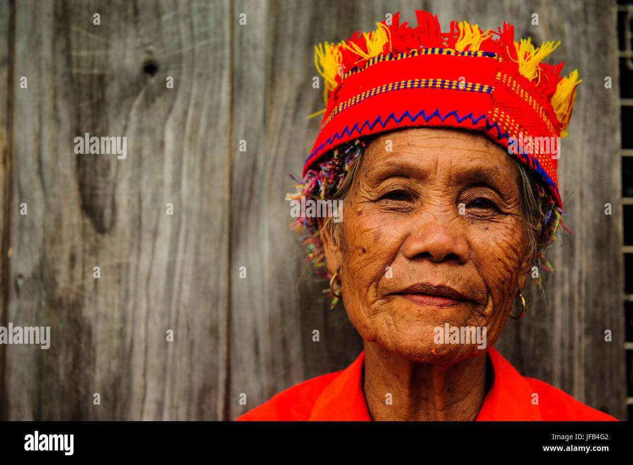 Traditional dressed Ifugao woman sitting in the Unesco world heritage ...