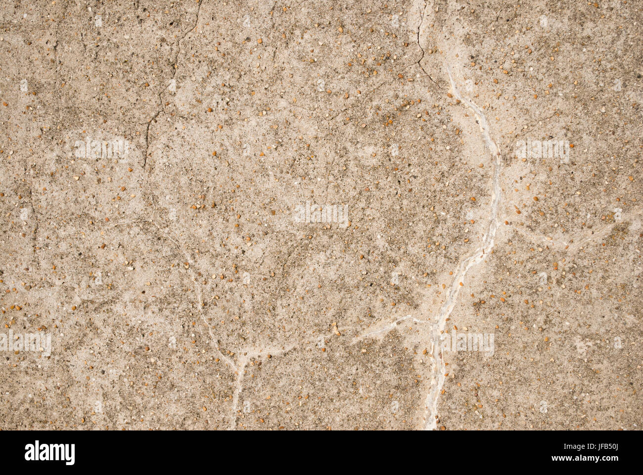 Background texture. Light beige coloured old stone wall with cracks and ...
