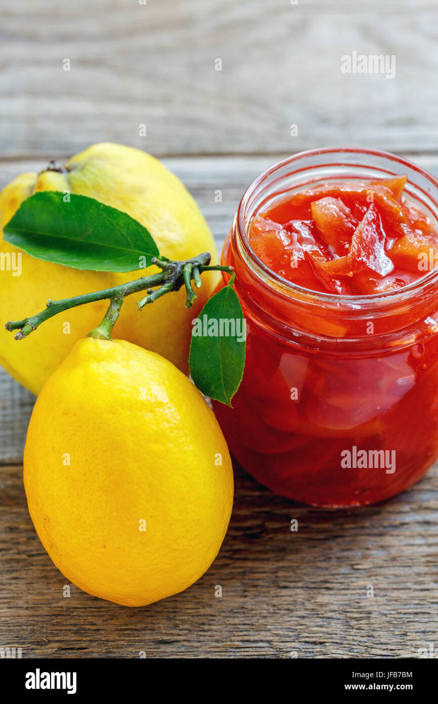 Delicious quince jam in jar and fruit Stock Photo - Alamy