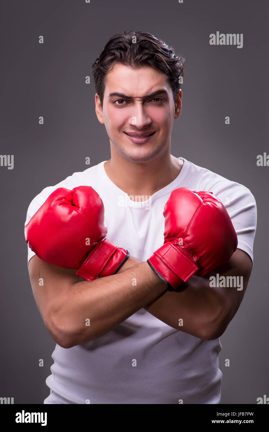 Handsome boxer in boxing concept Stock Photo - Alamy