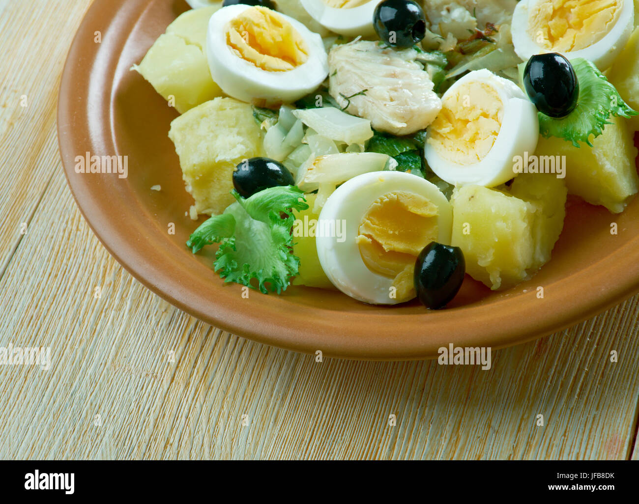 Portuguese cod fish with vegetables Stock Photo - Alamy