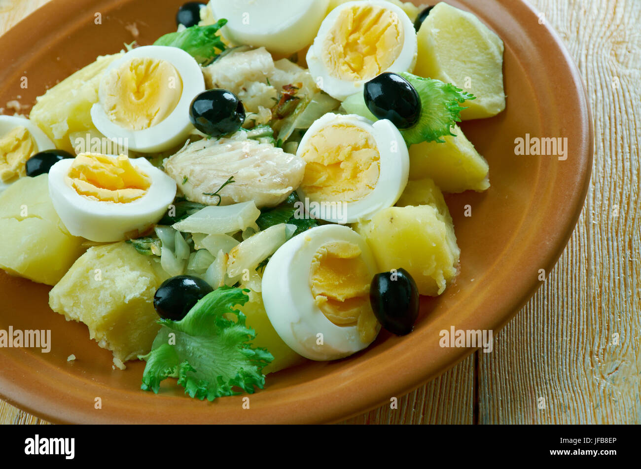 Portuguese cod fish with vegetables Stock Photo - Alamy