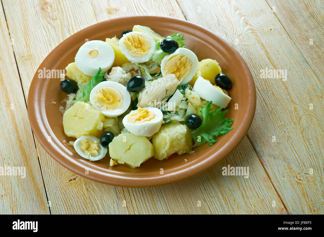 Portuguese cod fish with vegetables Stock Photo - Alamy