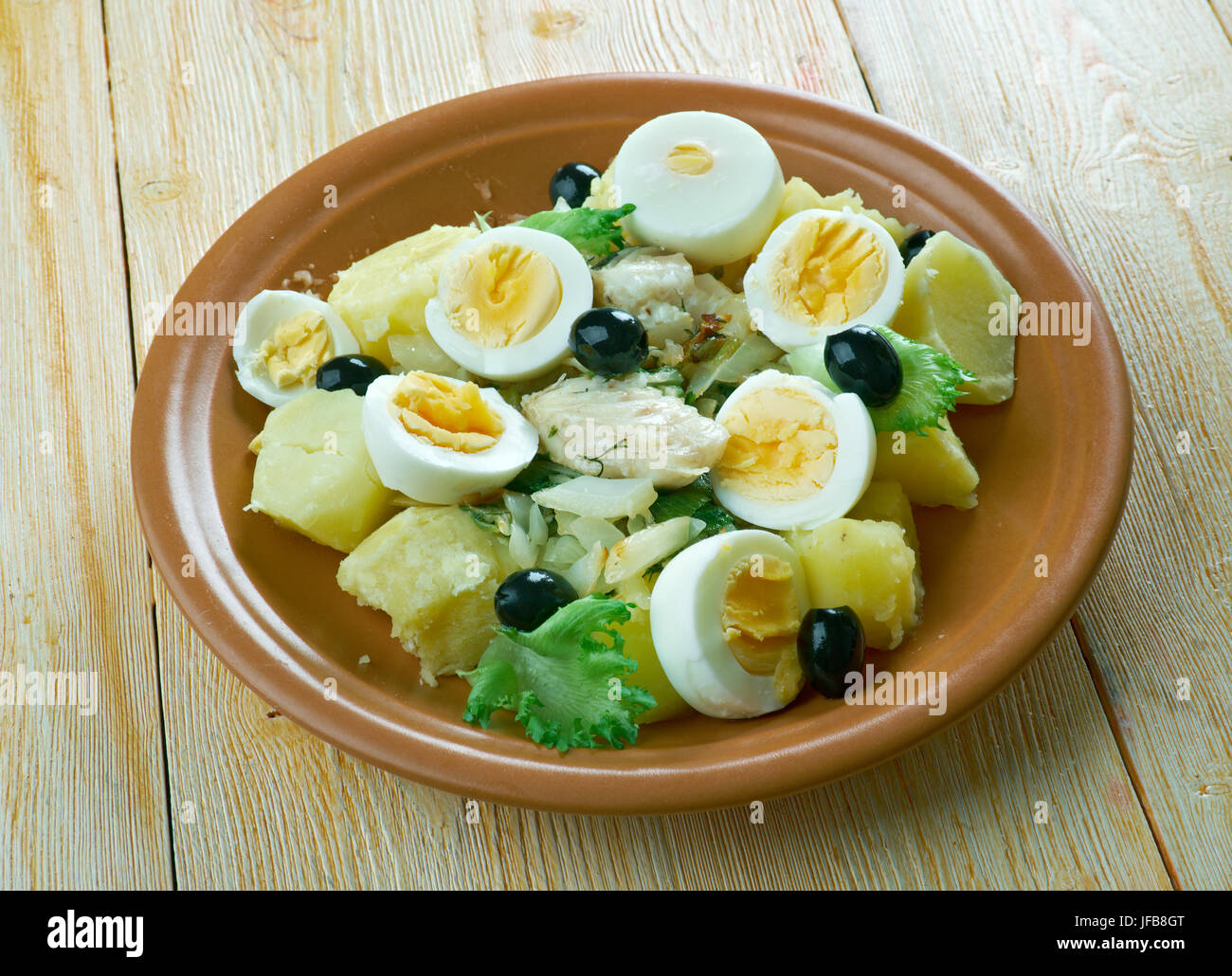 Portuguese cod fish with vegetables Stock Photo - Alamy