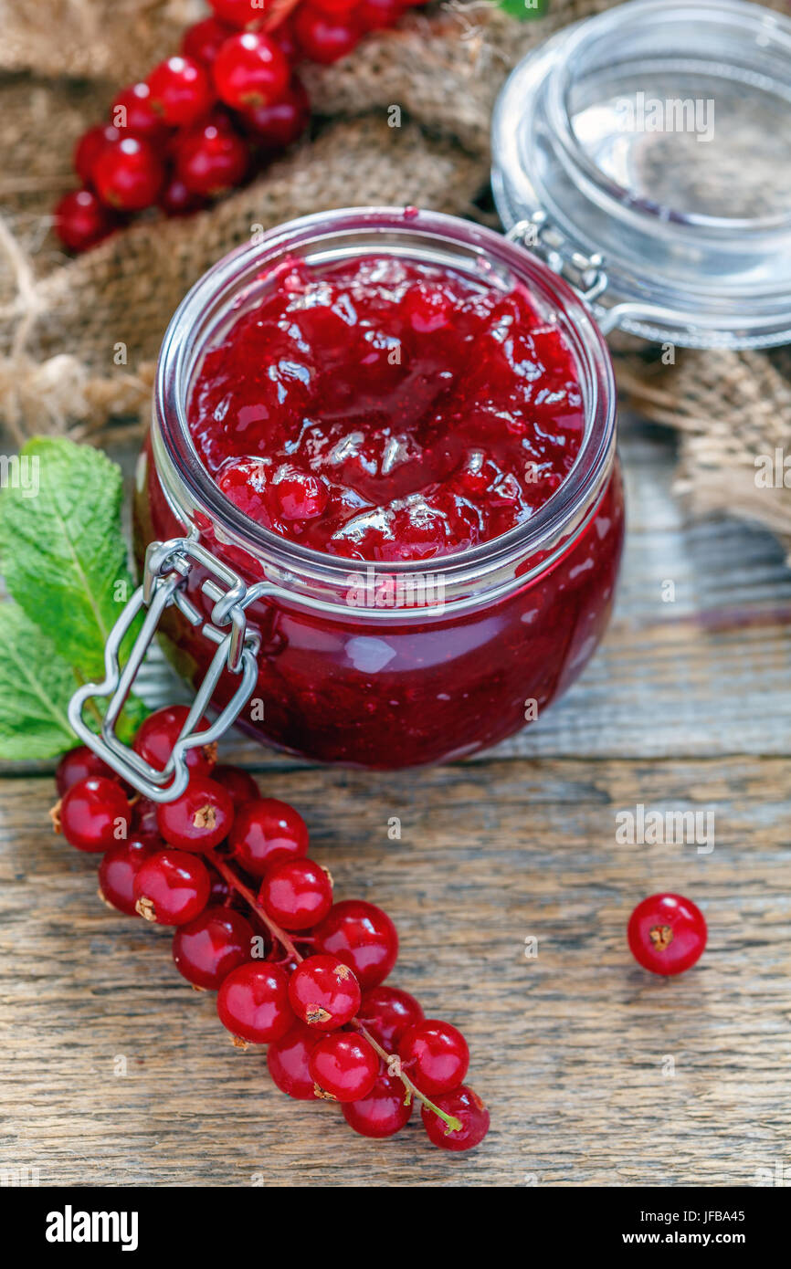 Delicious homemade red currant jam in glass jar closeup Stock Photo - Alamy