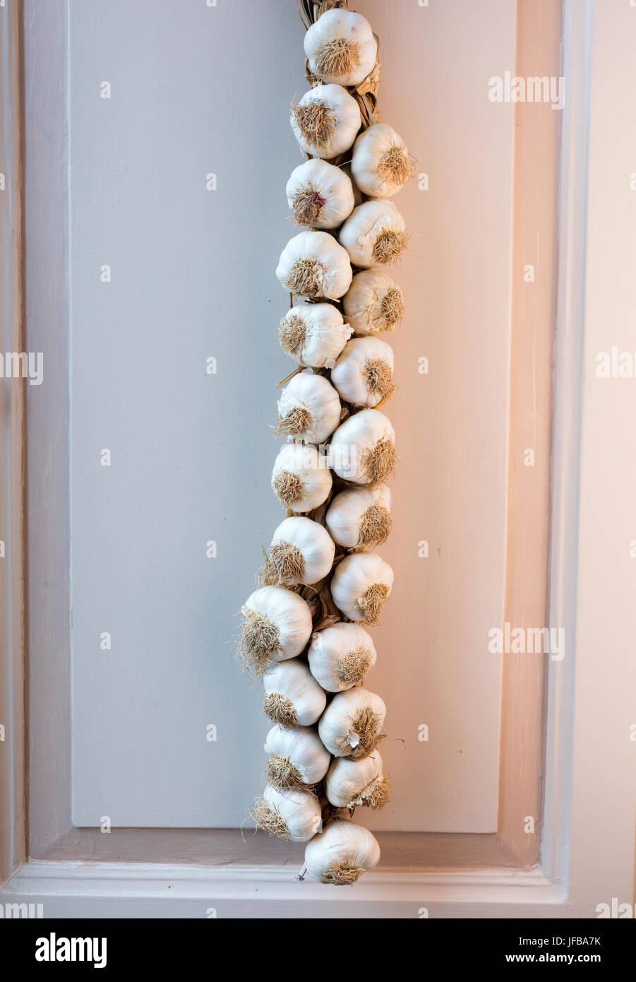 A garlic braid Stock Photo - Alamy