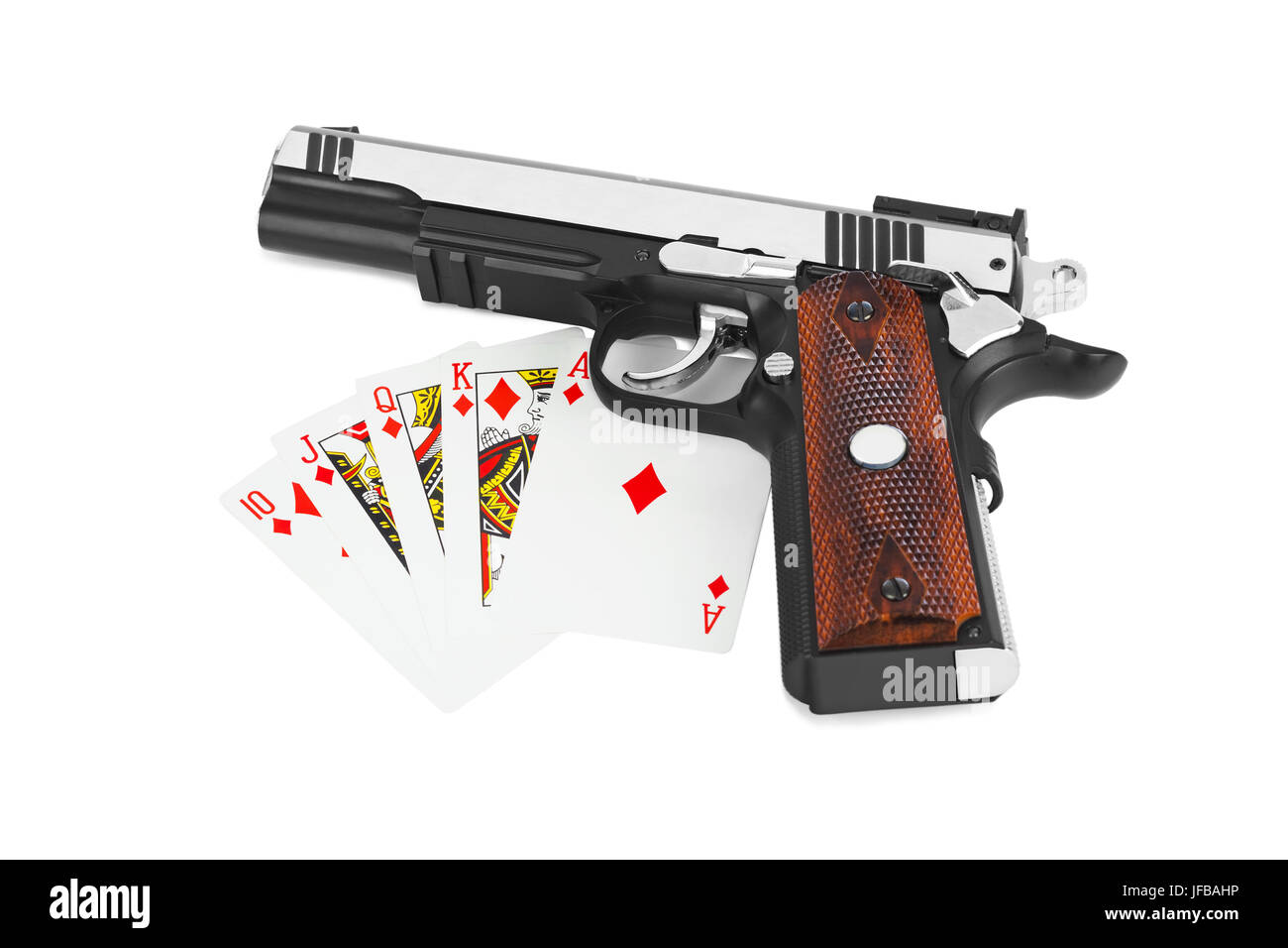 Gun and playing cards Stock Photo - Alamy
