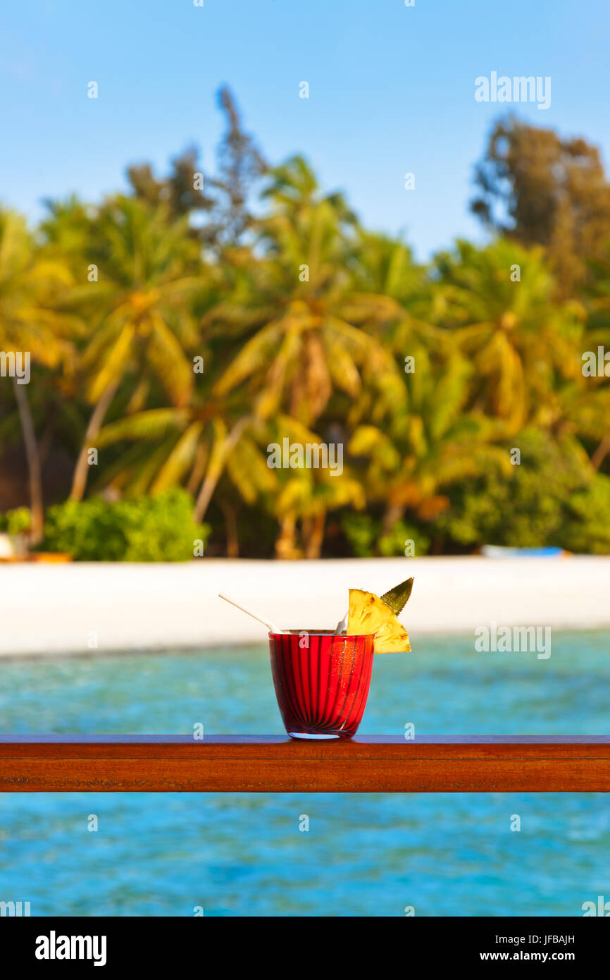 Fruit cocktail on Maldives beach Stock Photo - Alamy