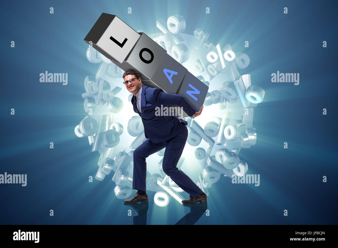 Man under the burden of loan Stock Photo - Alamy