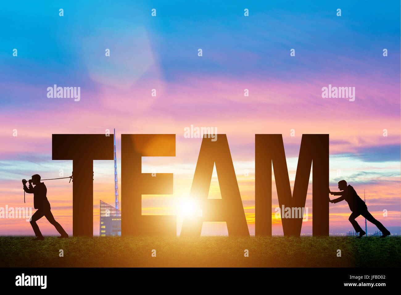 Teamwork concept with the word team Stock Photo - Alamy