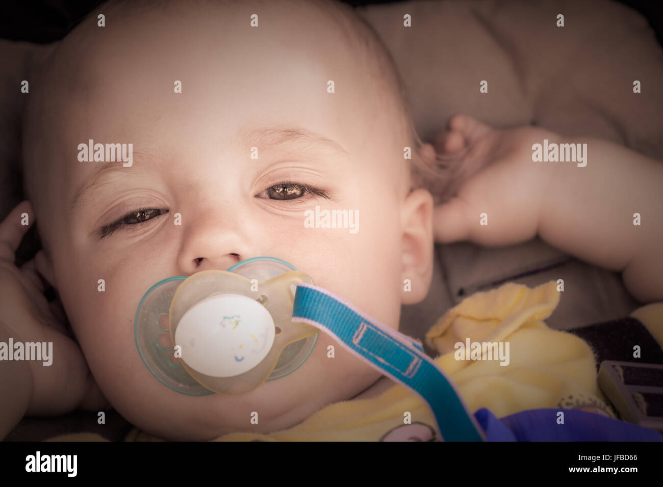 Boy almost asleep Stock Photo - Alamy