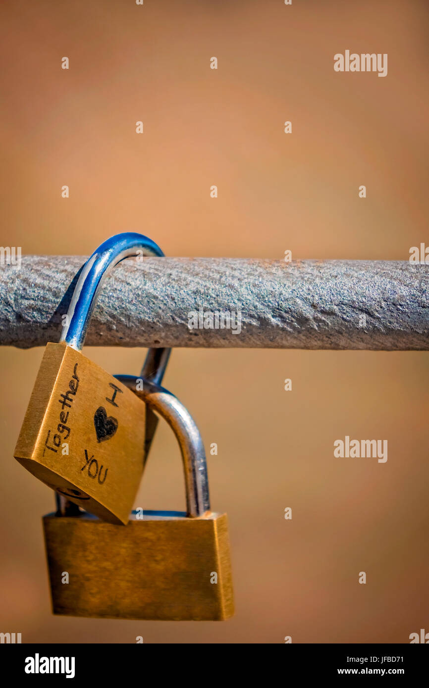 Two padlocks locked together hi-res stock photography and images - Alamy