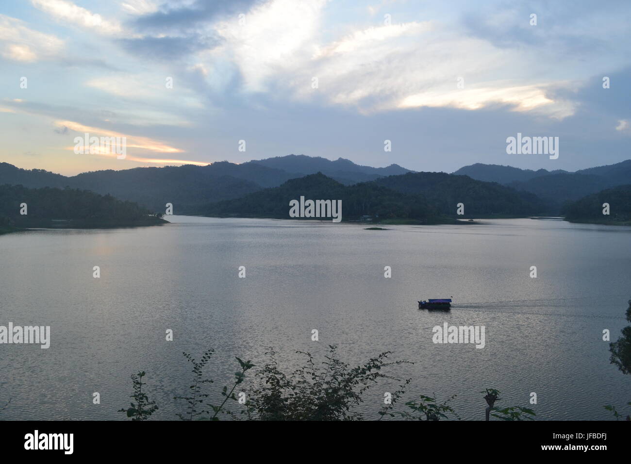 Beautiful Sunset On Sermo Lake, Cental Java, Indonesia Stock Photo - Alamy