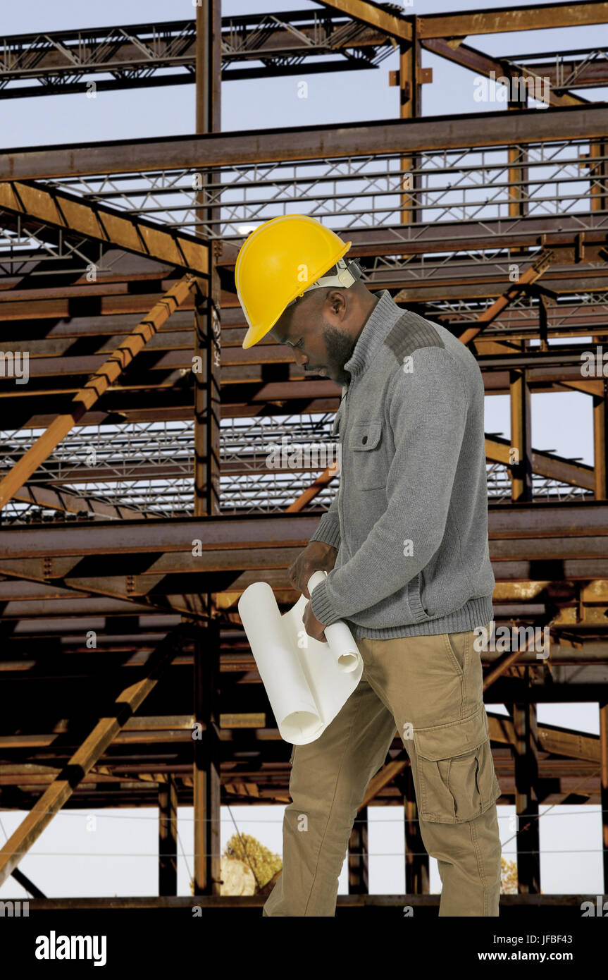 Black Construction Worker with Blueprints Stock Photo - Alamy