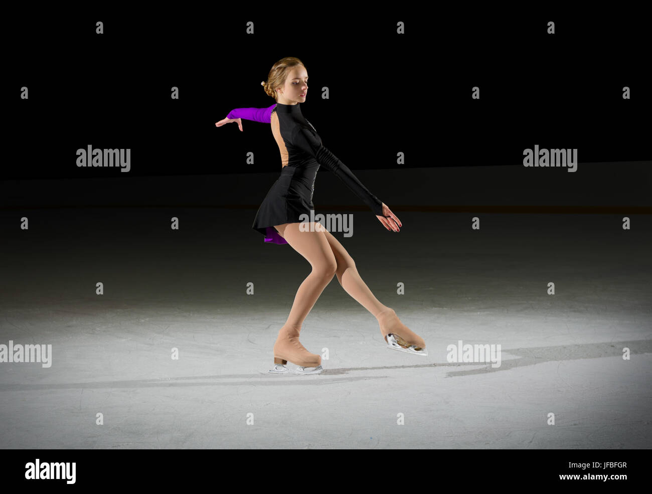 Young girl figure skater Stock Photo - Alamy