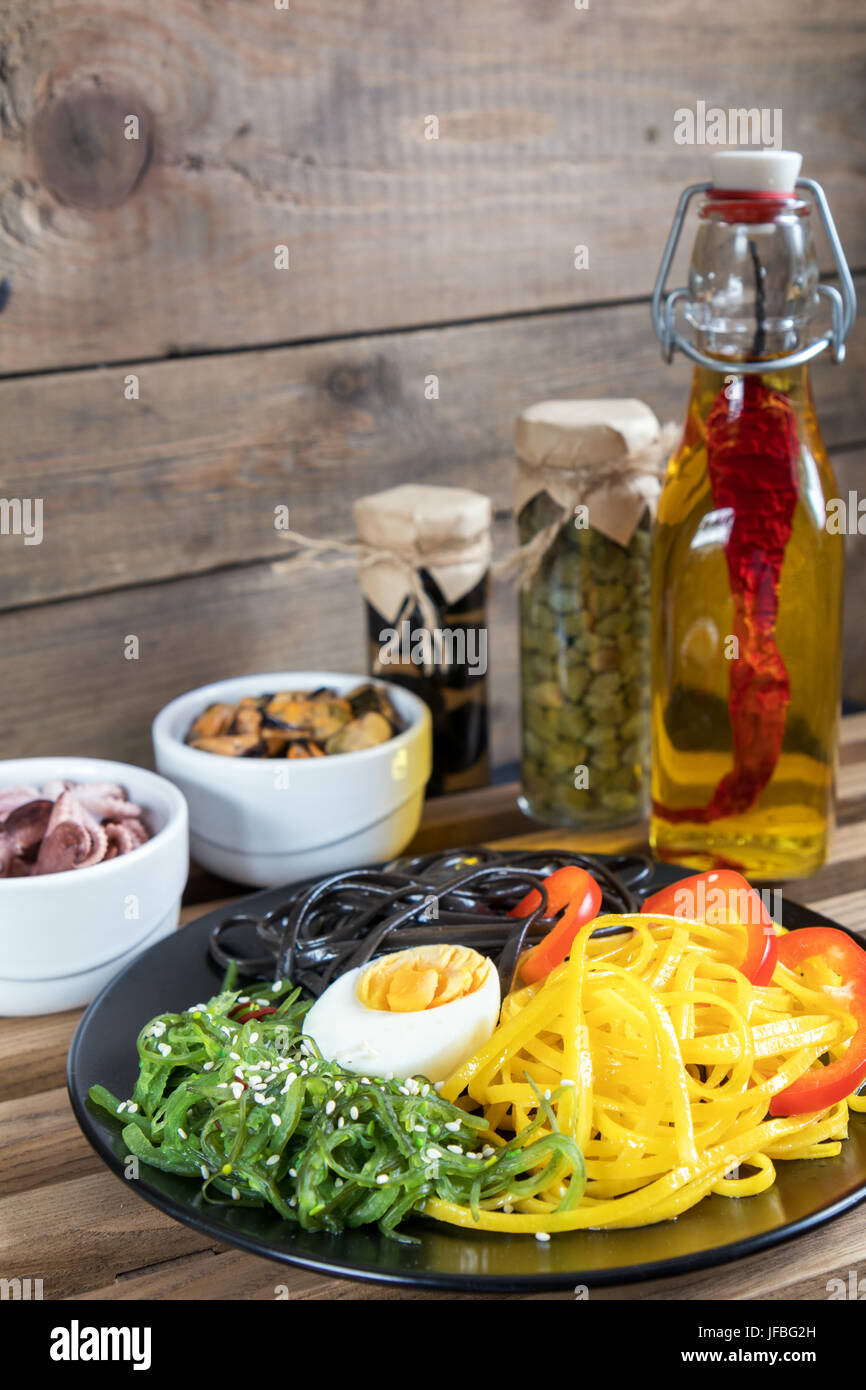 Hiyashi wakame, black and corn noodles Stock Photo - Alamy