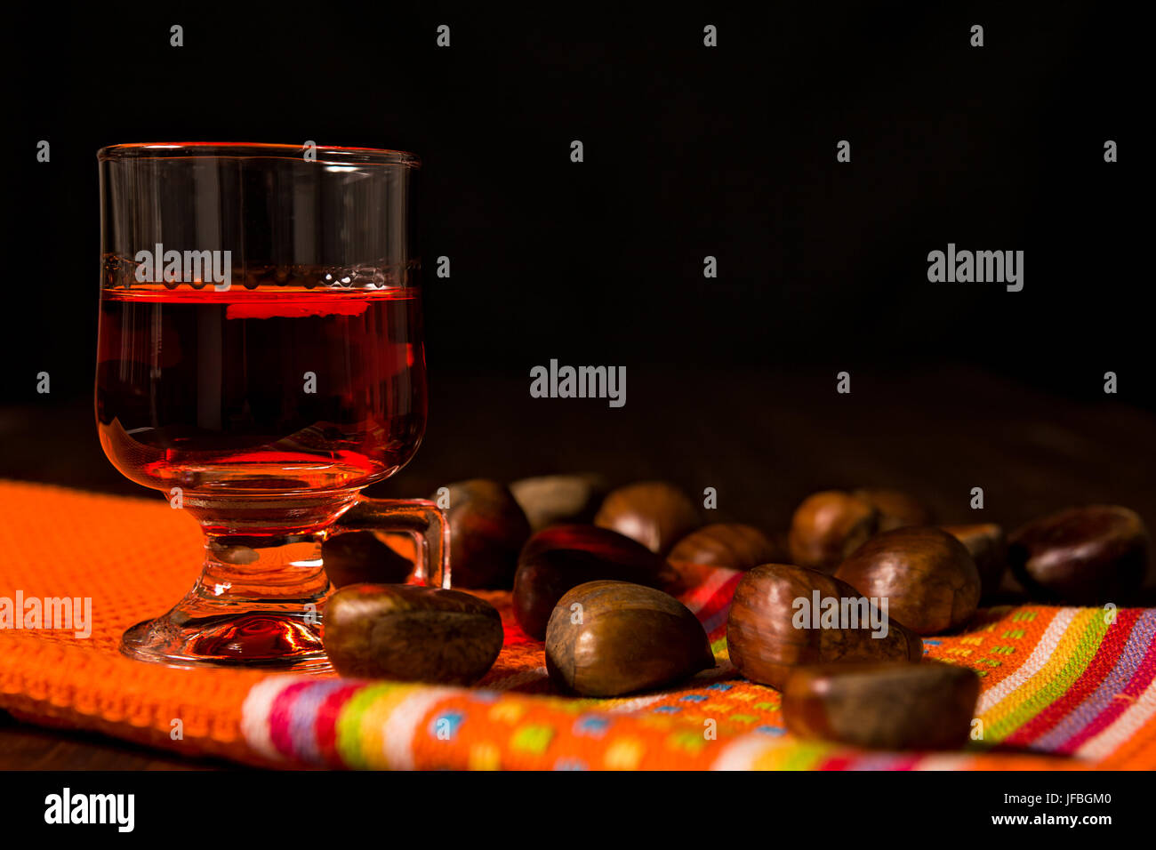Alcoholic punch drink and chestnuts Stock Photo - Alamy